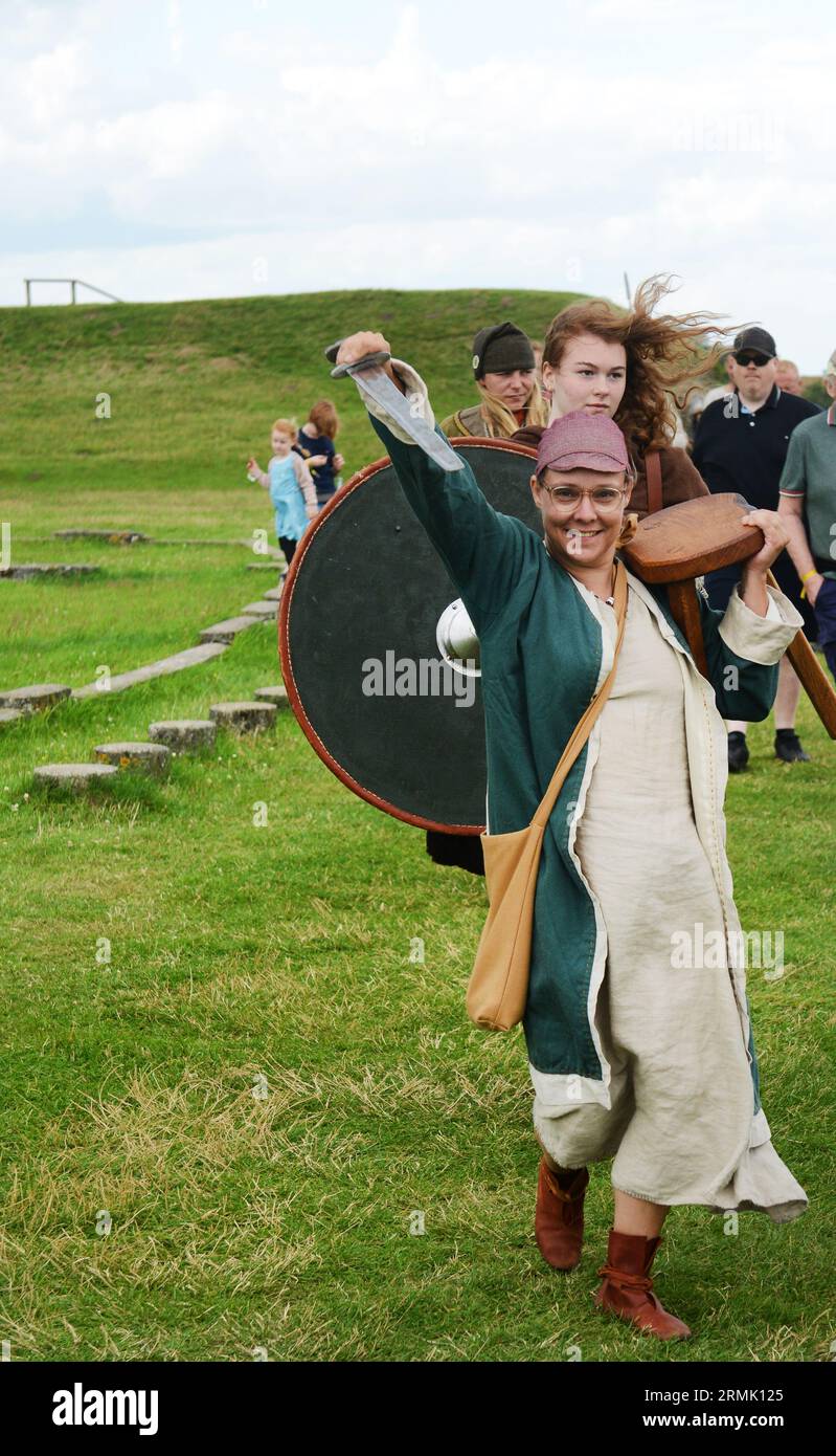 Participants dressed in traditional Viking clothes at the Trelleborgs ...