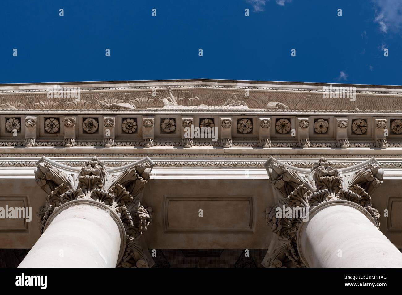 The Royal Exchange building, designed by Sir William Tite, features a portico made up of eight ...