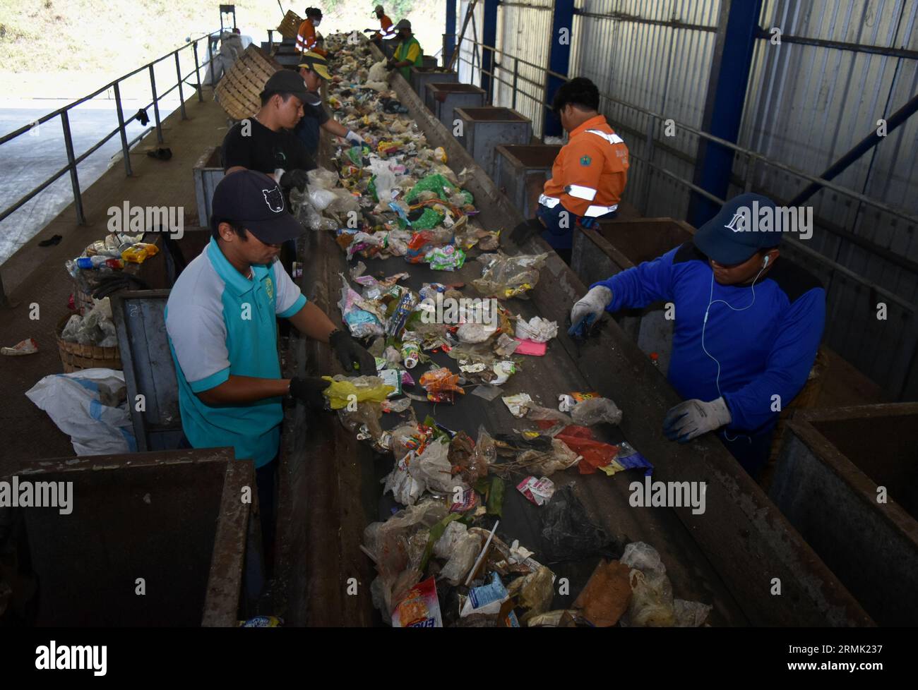 August 29, 2023, Malang city, East Java, Indonesia: some of workers ...