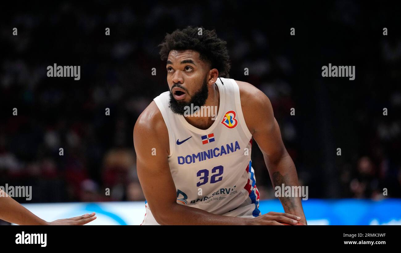 Dominican Republic forward Karl-Anthony Towns (32) handles the ball ...