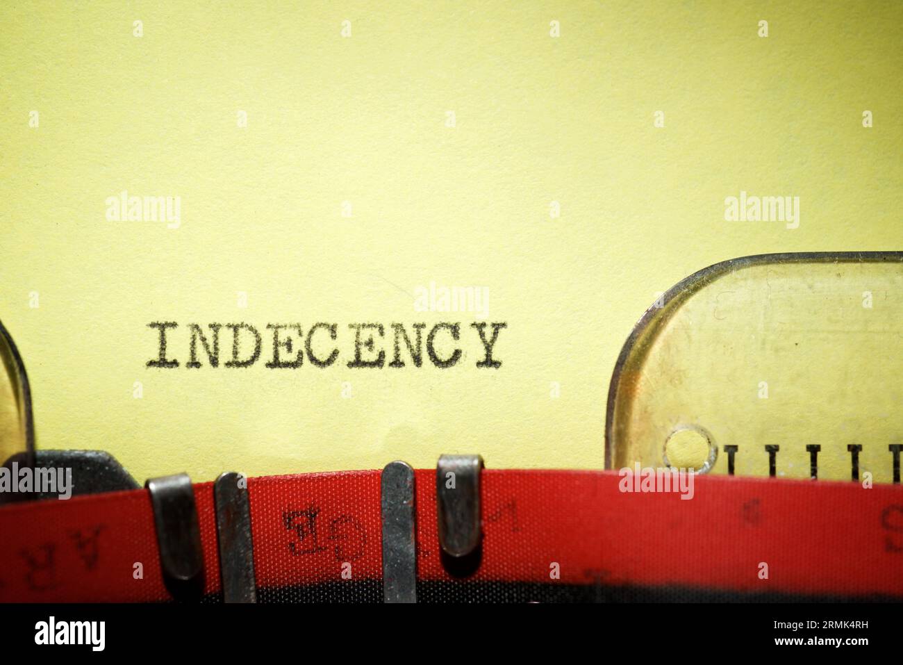 indecency word written with a typewriter Stock Photo - Alamy