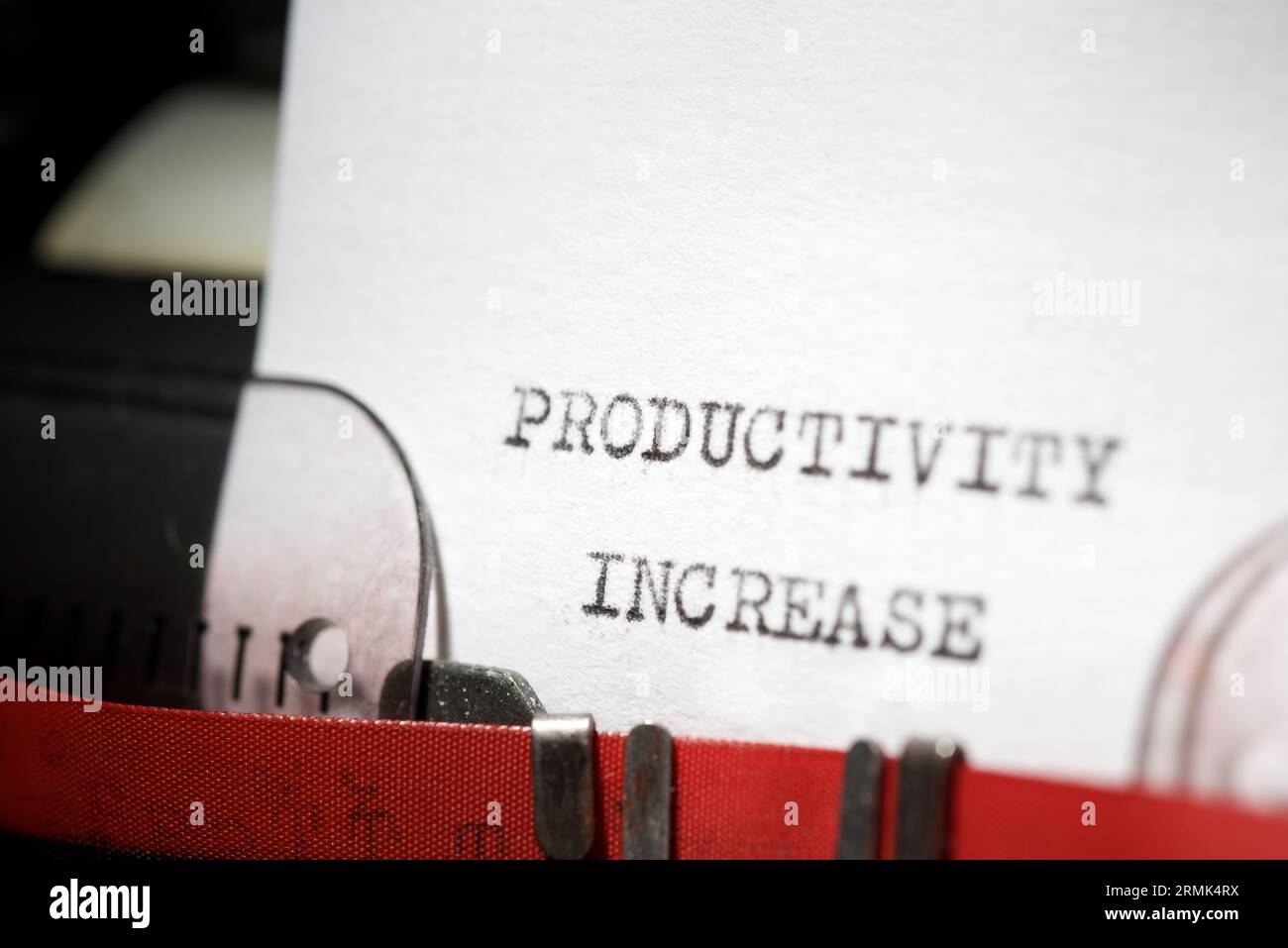 Productivity increase text written with a typewriter Stock Photo - Alamy