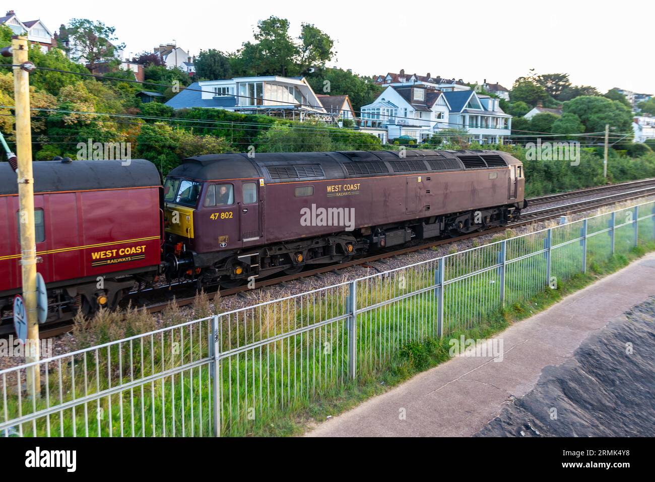 Vintage Class 47 diesel locomotive with special charter train passing ...