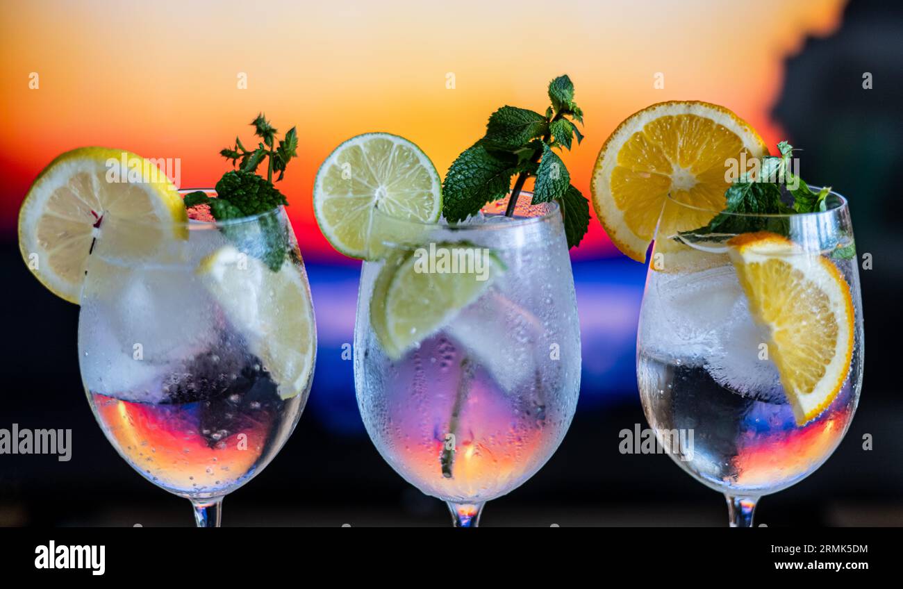Three Colorful Gin Tonic Cocktails In Glasses At Bar Counter In Pup Or ...