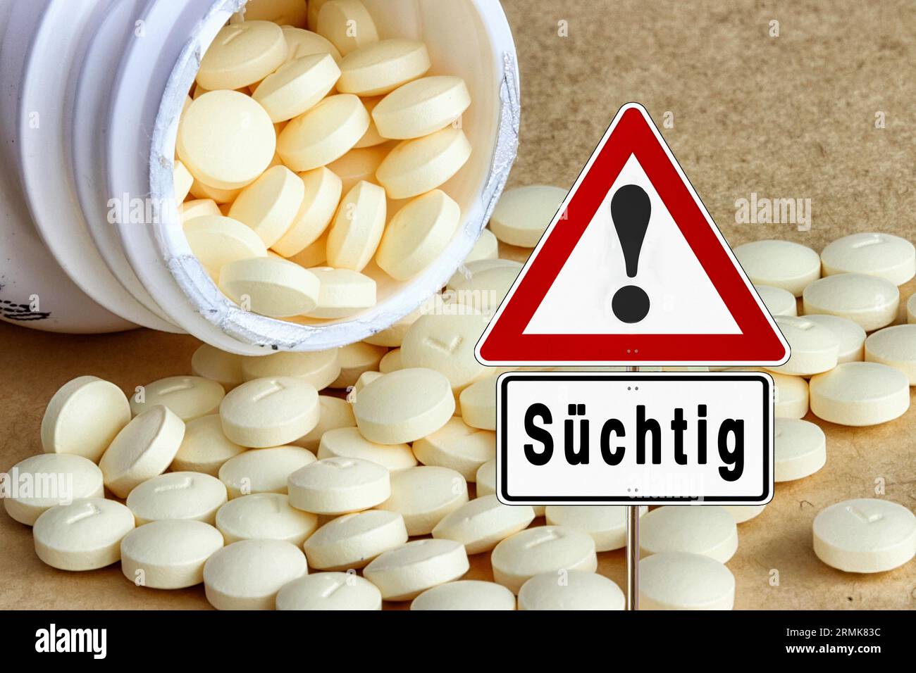 Symbol image, attention sign for tablet addiction, danger of addiction ...