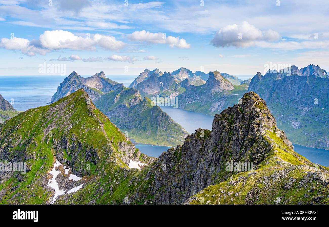 Mountain landscape with steep rocky peaks fjords and sea, view from the ...