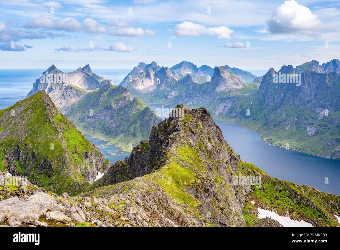 Mountain landscape with steep rocky peaks fjords and sea, view from the ...