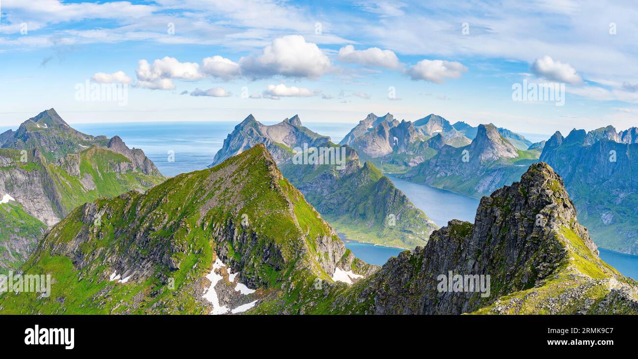 Mountain landscape with steep rocky peaks fjords and sea, view from the ...