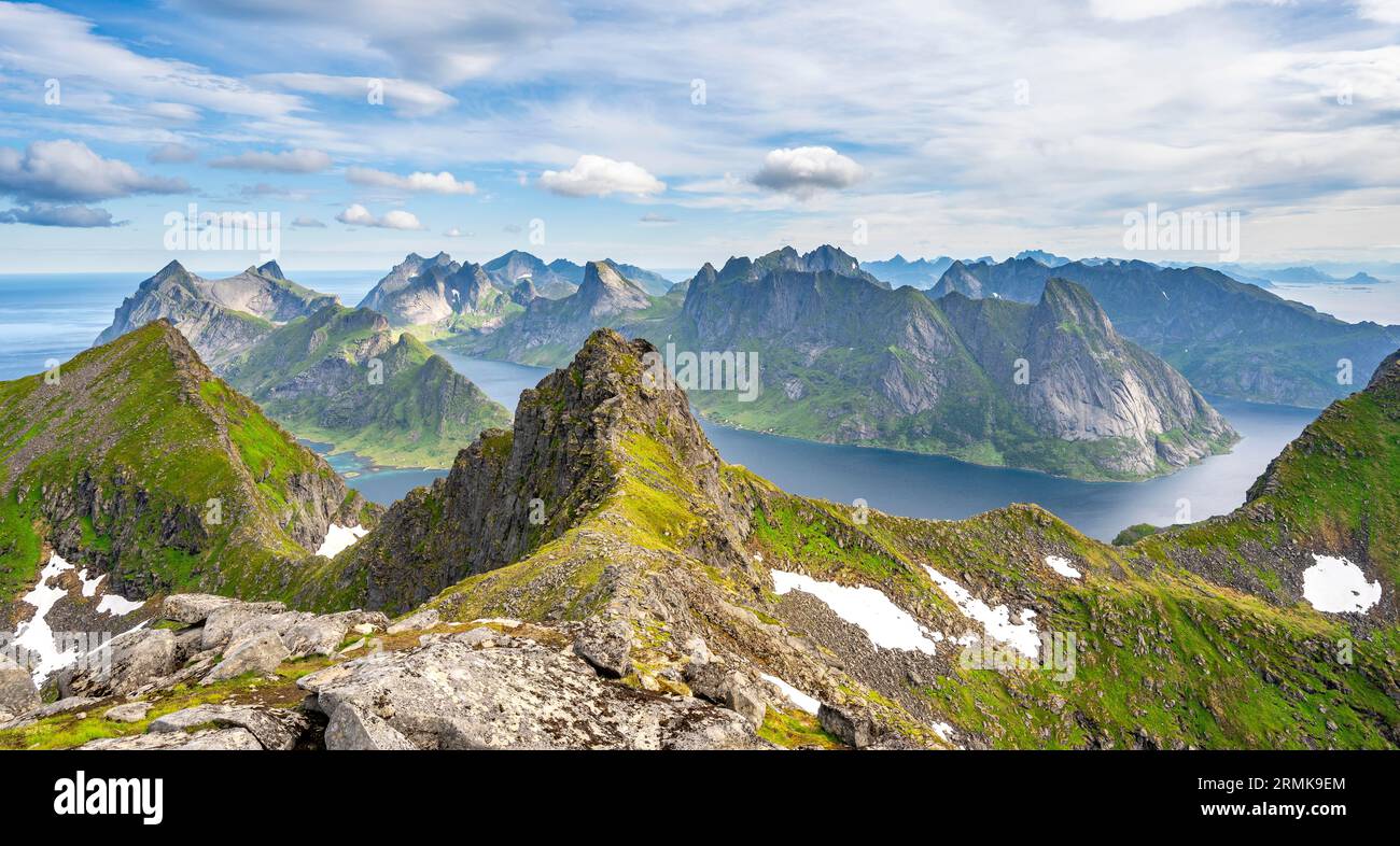 Mountain landscape with steep rocky peaks fjords and sea, view from the ...