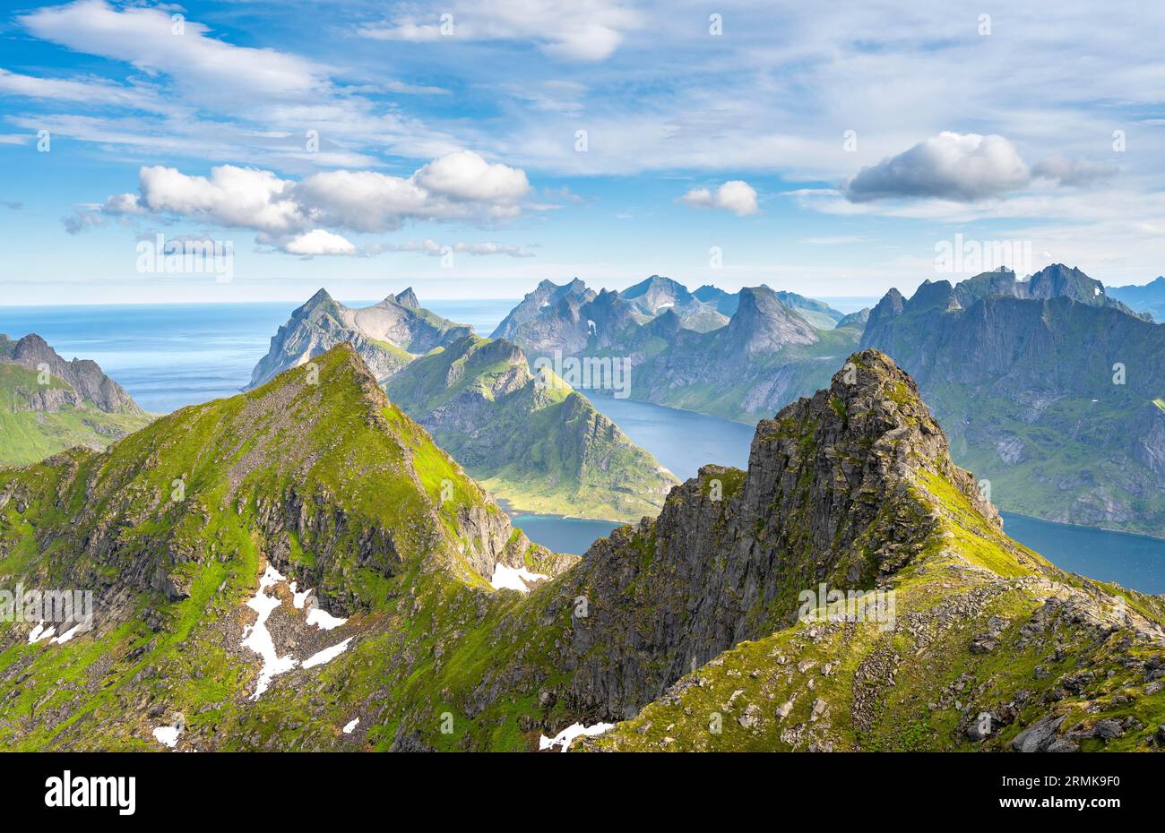 Mountain landscape with steep rocky peaks fjords and sea, view from the ...