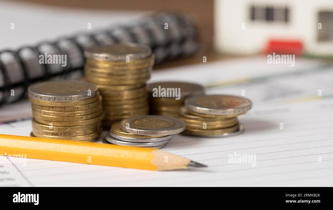 Bunch coins paper arrangement Stock Photo - Alamy