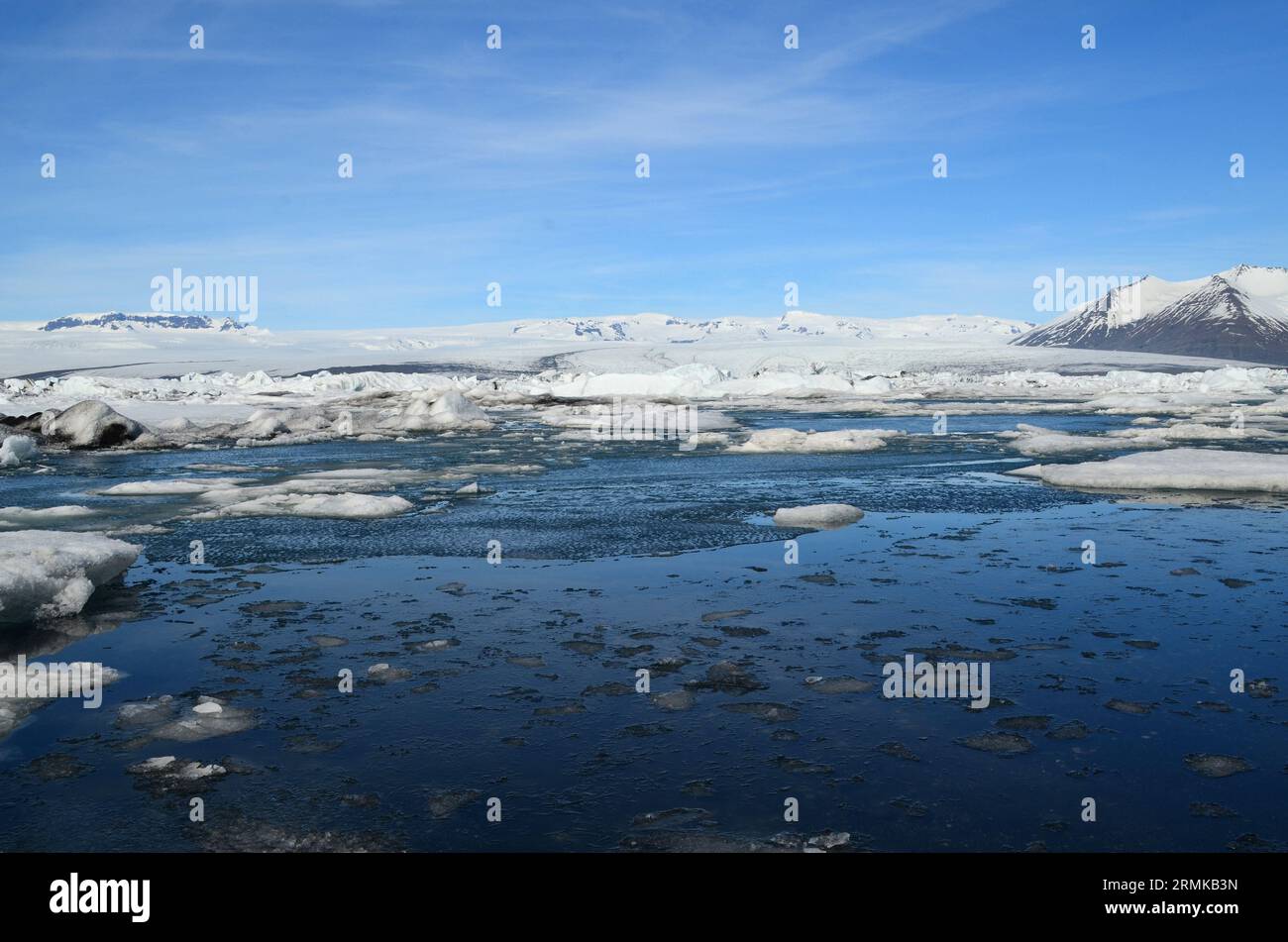 Water rushing and flowing between the icebergs and ice chunks in ...