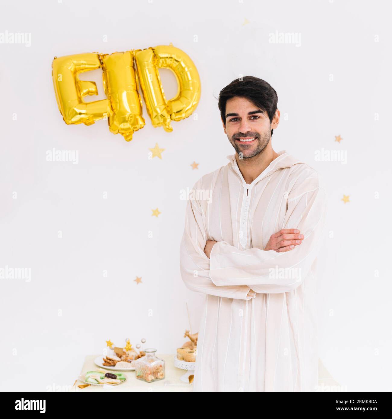 Eid al fitr concept with muslim man Stock Photo - Alamy