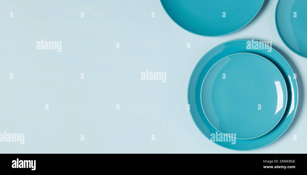 Flat lay blue plates arrangement with copy space Stock Photo - Alamy