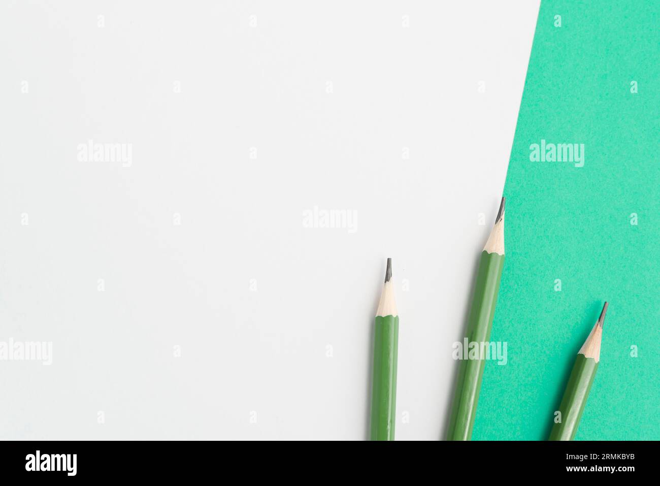 Green sharp pencils dual background Stock Photo - Alamy Green sharp pencils dual background Stock Photo - Alamy