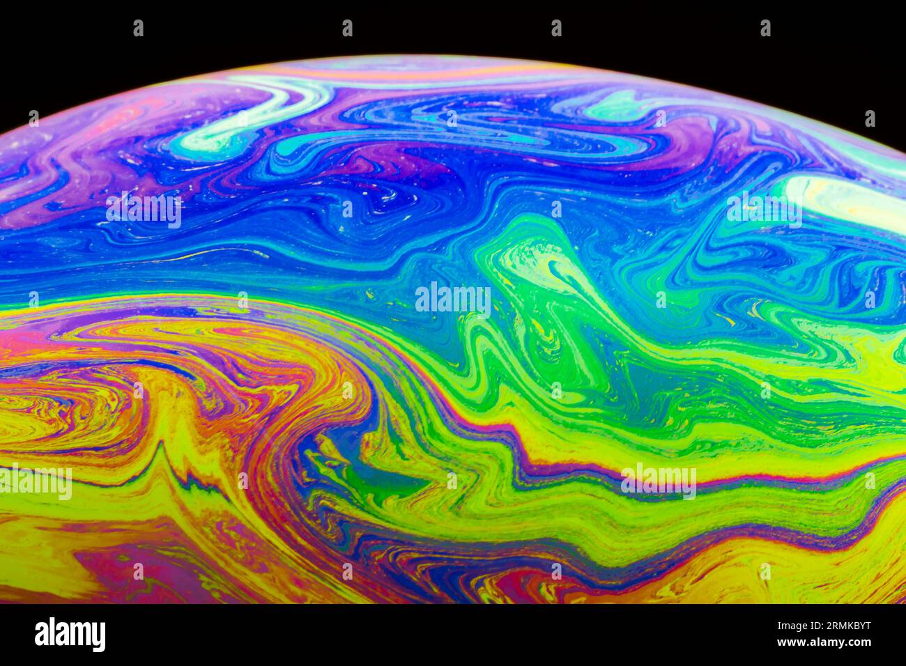 Gradient multicolored soap bubble black background Stock Photo - Alamy