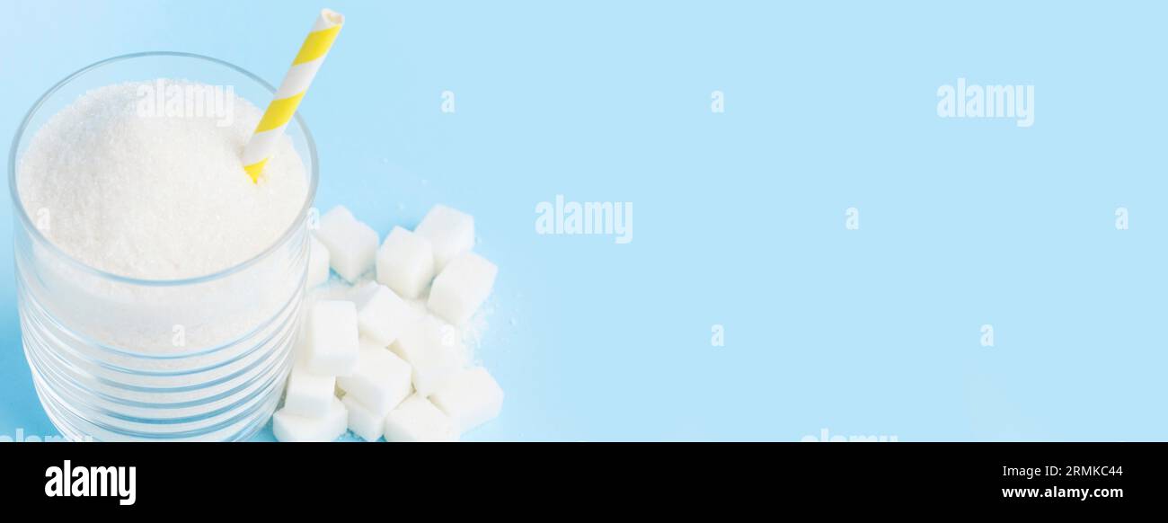 High angle glass with sugar straw Stock Photo - Alamy