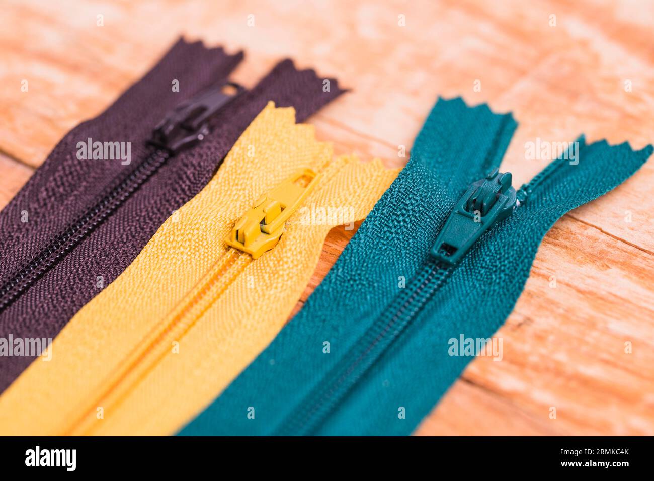 Line three different zips Stock Photo - Alamy