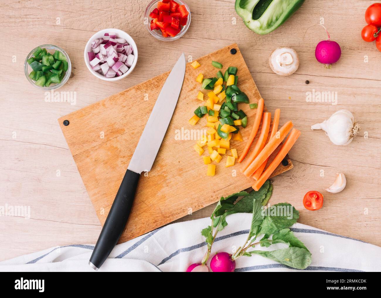 Overhead view chopping board with knife vegetables wooden desk Stock ...