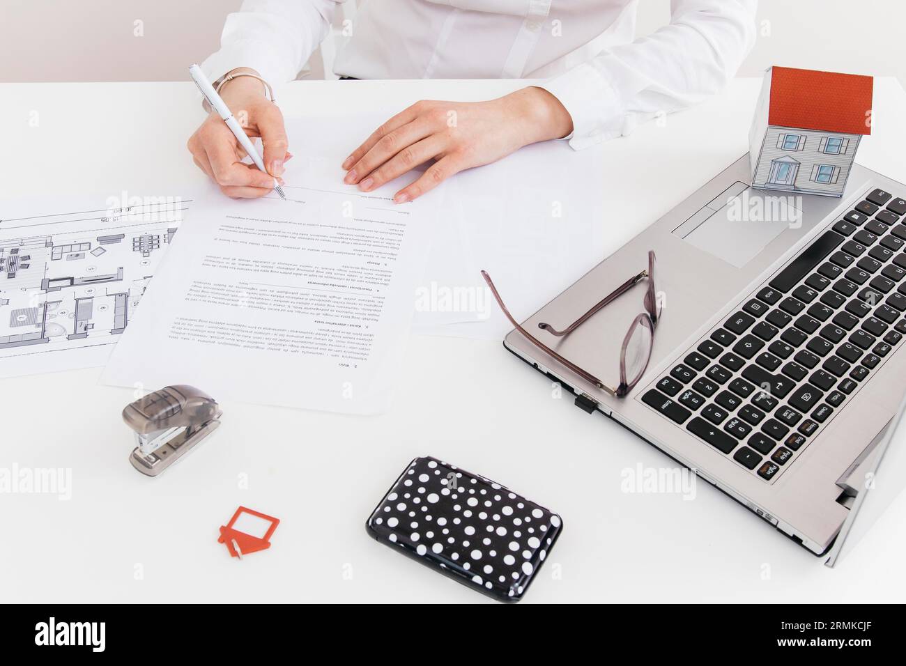 Overhead view human hand putting signature official paper office Stock ...