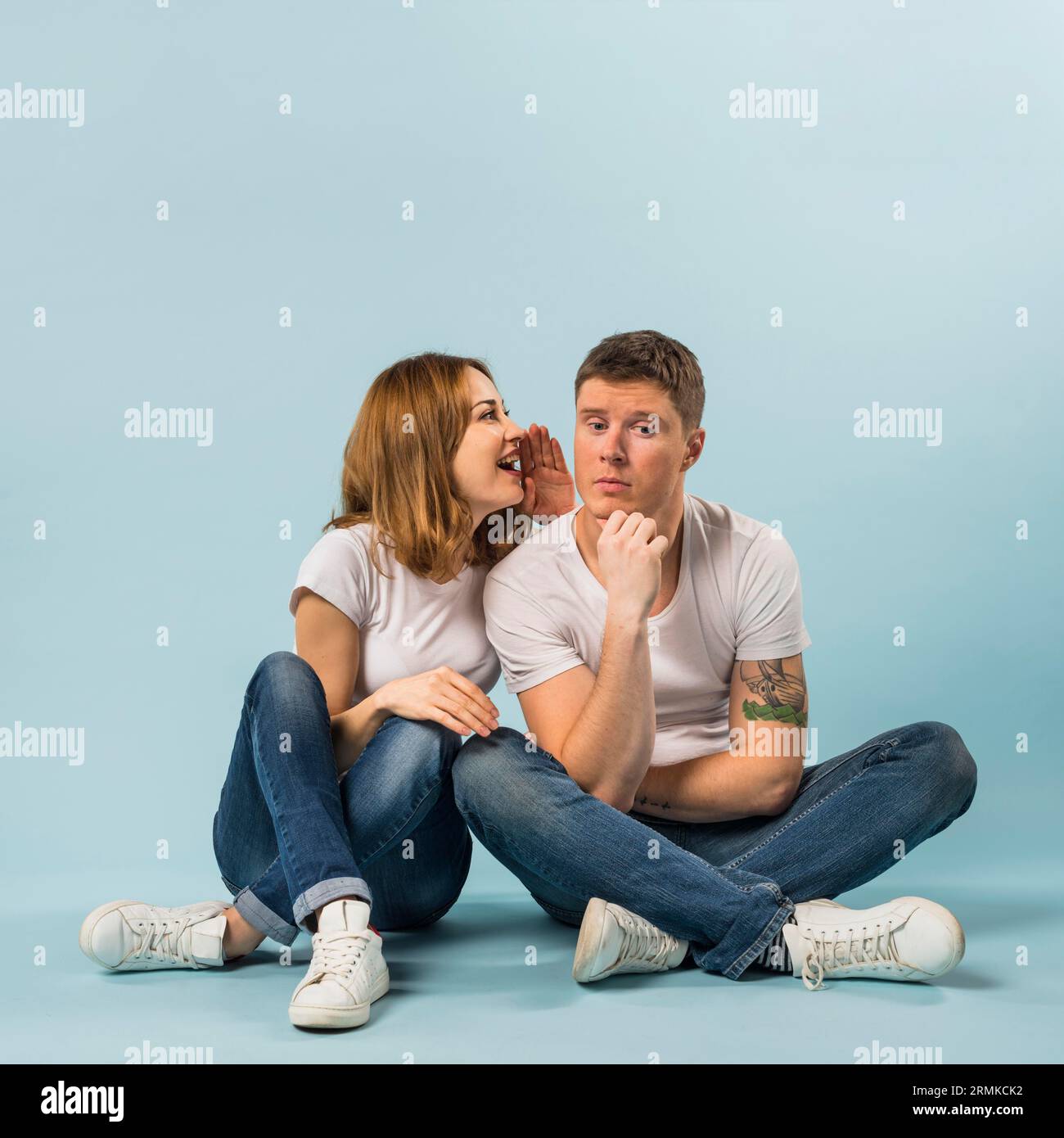 Telling secret hi-res stock photography and images - Alamy