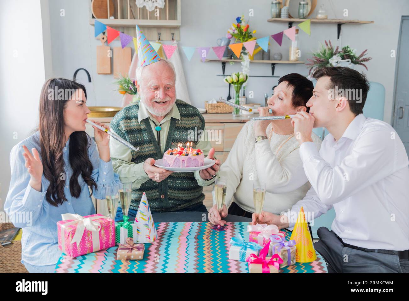 Senior people celebrating birthday Stock Photo - Alamy