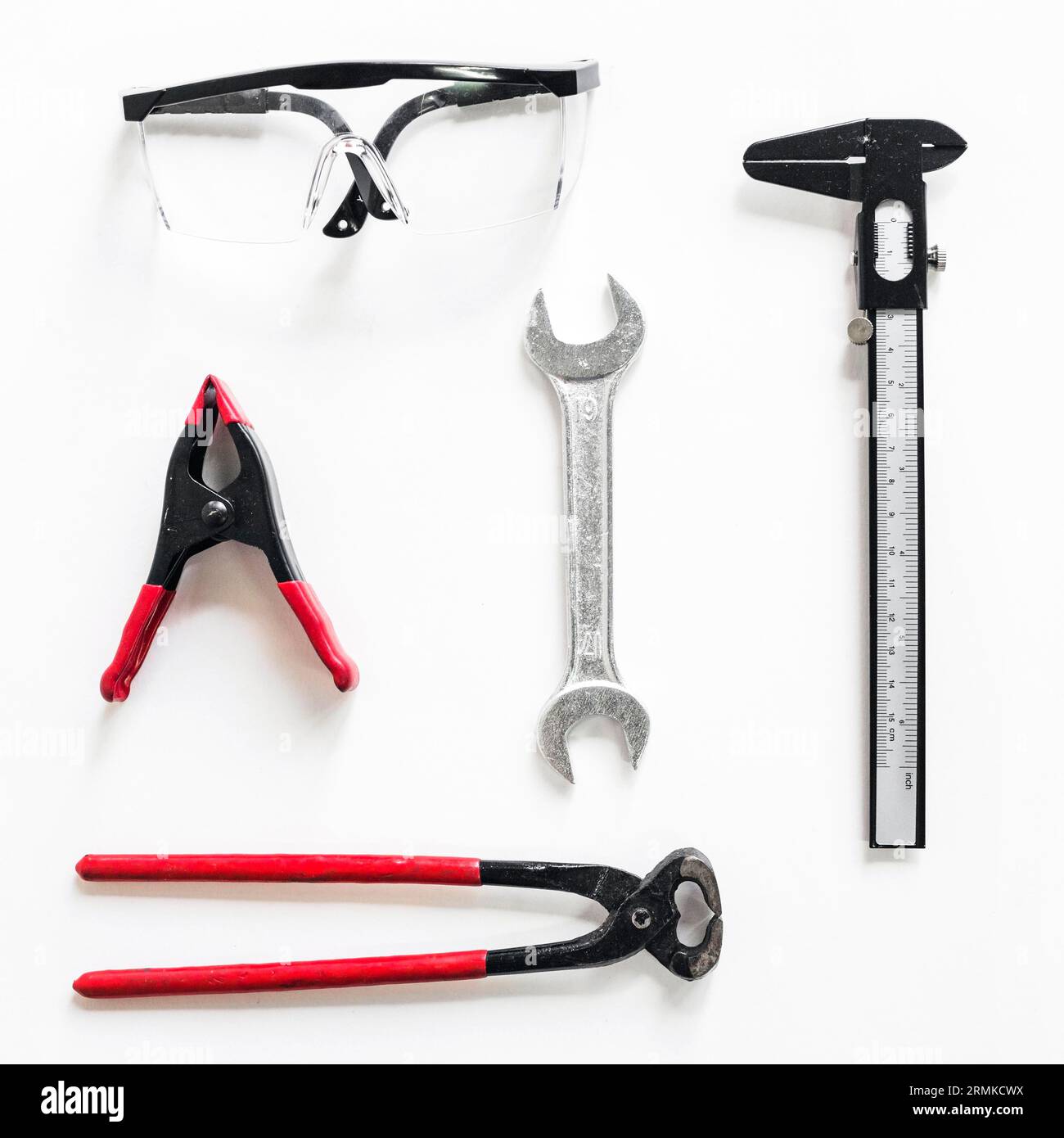Safety glasses near construction tools Stock Photo - Alamy