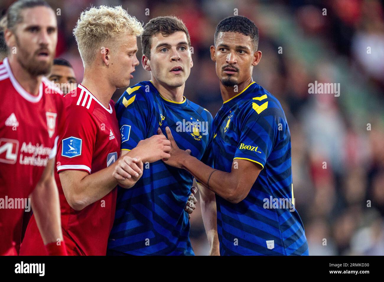 Vejle, Denmark. 28th Aug, 2023. Jacob Rasmussen (C) and Frederik Alves ...