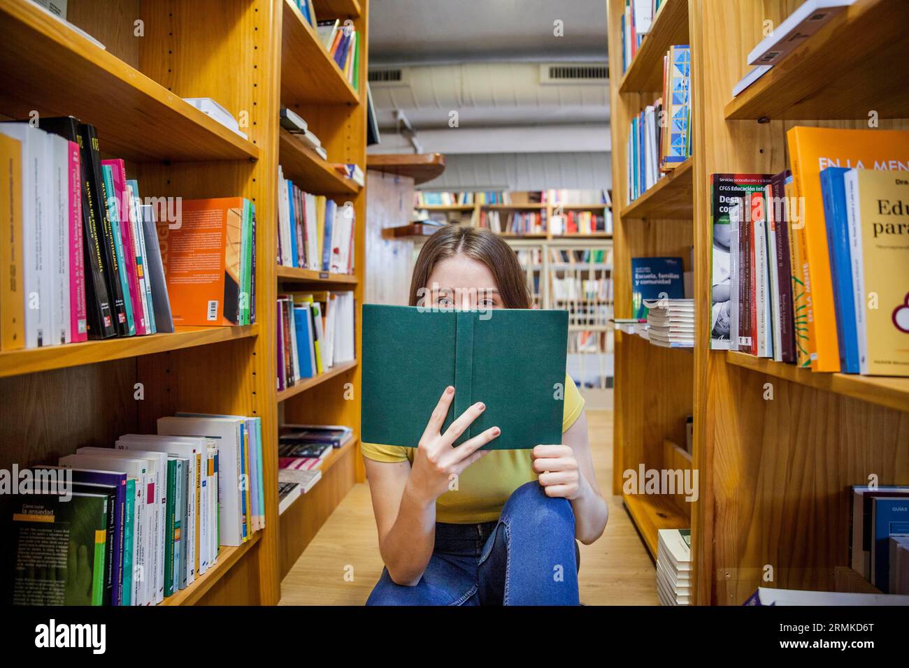 Book covering face hi-res stock photography and images - Alamy