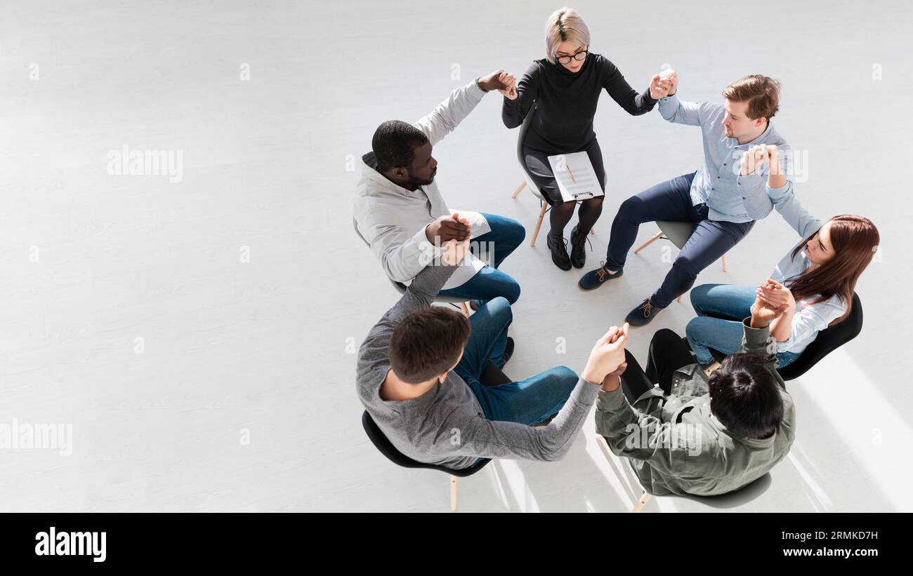 Top view circle people raising hands Stock Photo - Alamy
