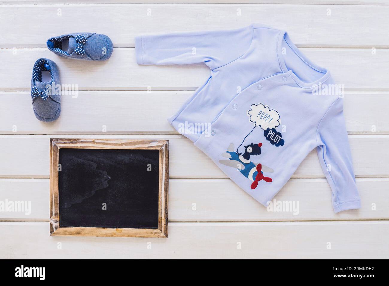 Baby boy concept with slate Stock Photo - Alamy Baby boy concept with slate Stock Photo - Alamy
