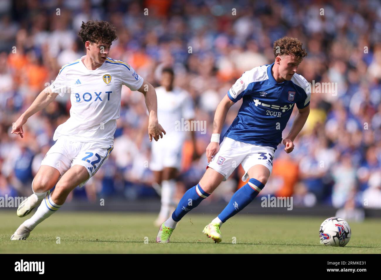 Nathan Broadhead of Ipswich Town takes on Archie Gray of Leeds United ...