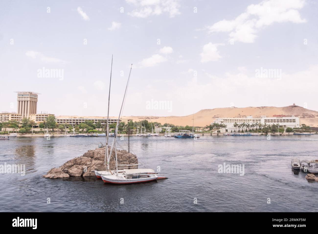 Egypt Summer Travel Riverside Tranquility: Small Boats by Luxor's Nile ...