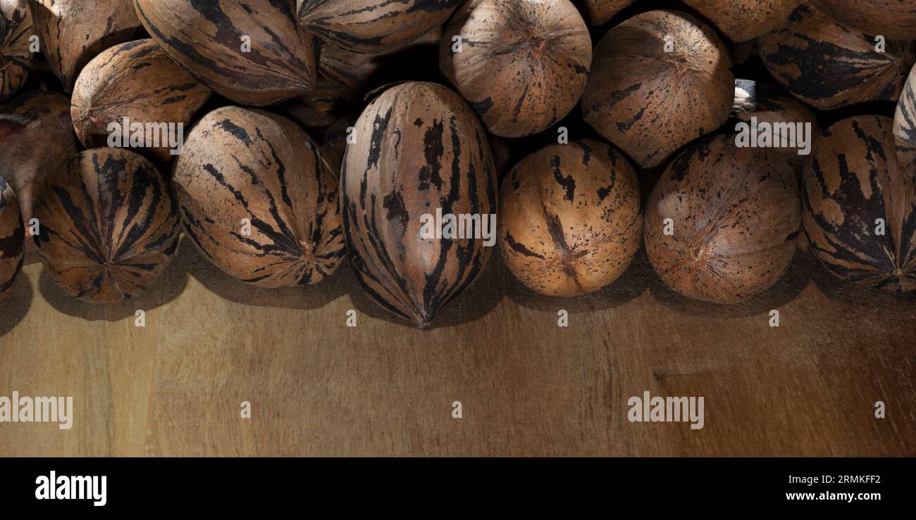 Tight shot of a large group of pecans in their shell Stock Photo - Alamy