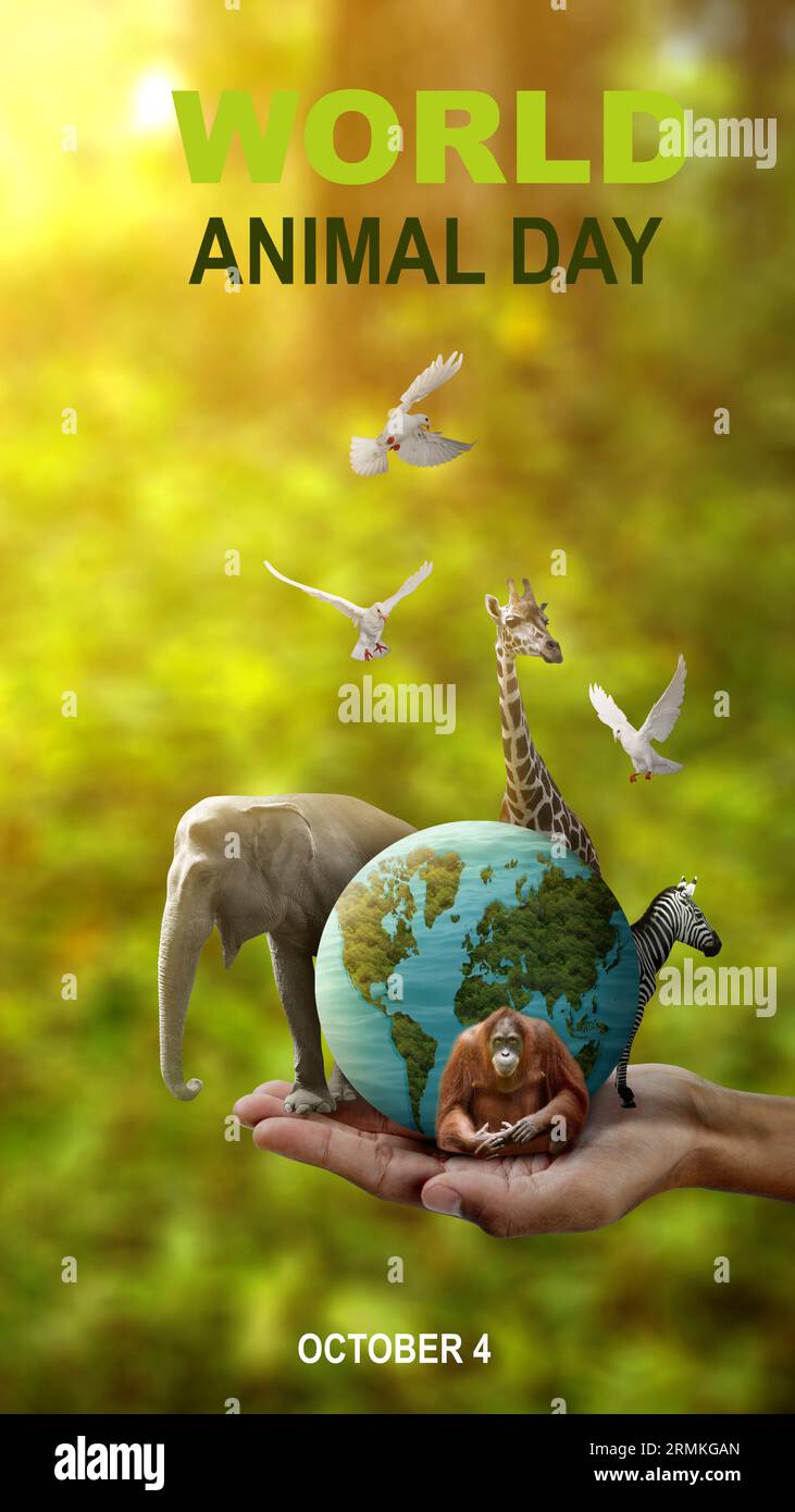 Human hand showing wildlife animal and earth. World Animal Day concept ...