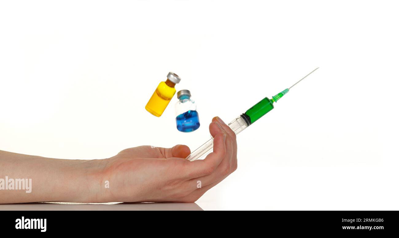 Medical Product Falling into Hand against White Background Stock Photo ...