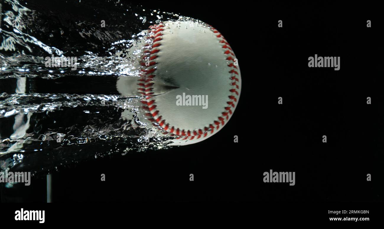 Baseball's Ball Falling into Water against White background Stock Photo ...
