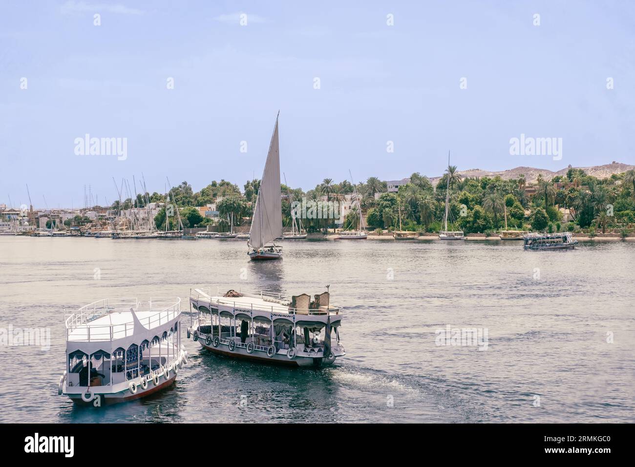 Egypt Summer Travel Riverside Tranquility: Small Boats by Luxor's Nile ...