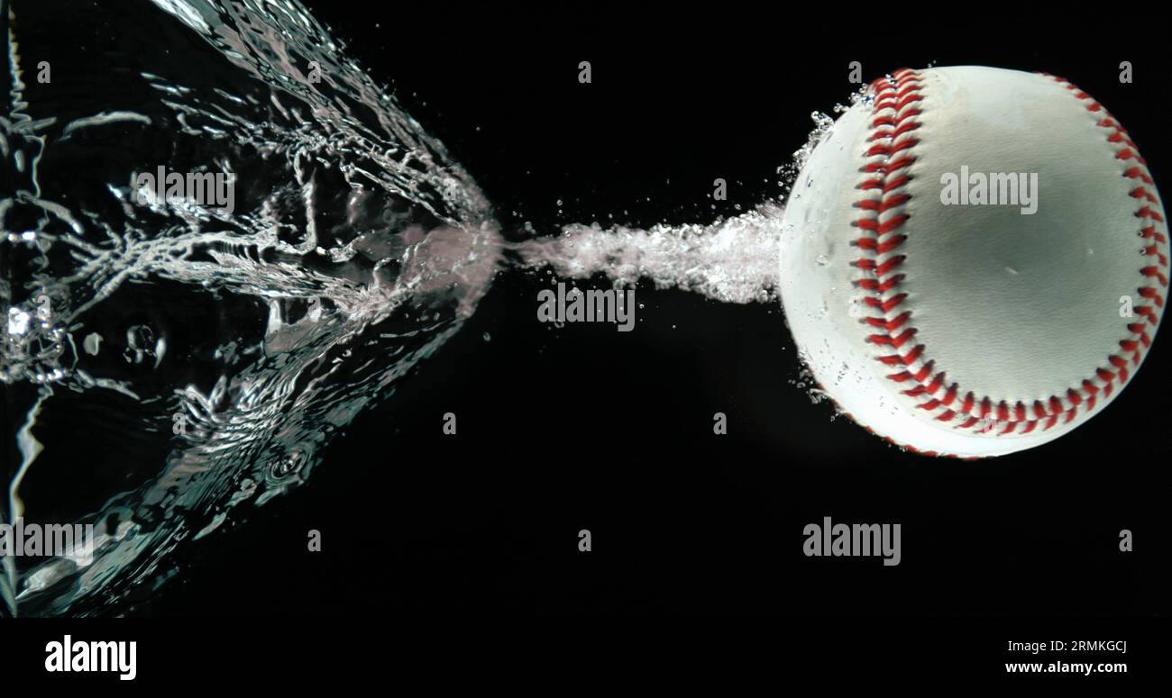 Baseball's Ball Falling into Water against White background Stock Photo ...