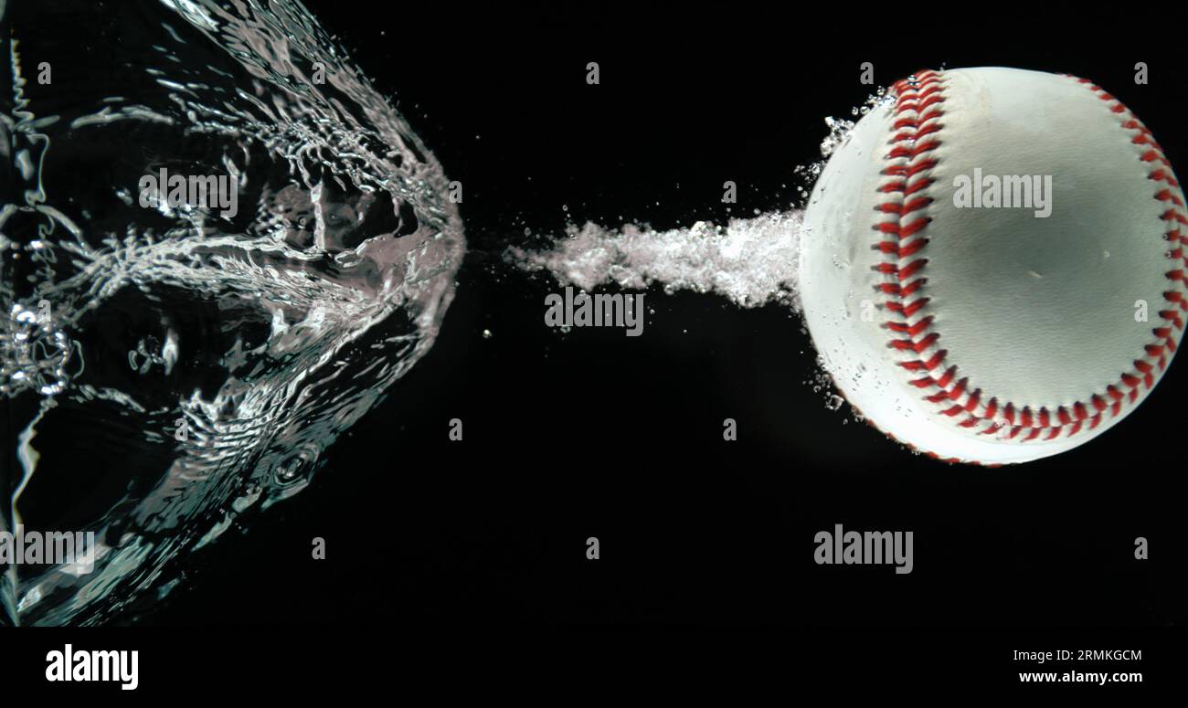 Baseball's Ball Falling into Water against White background Stock Photo ...