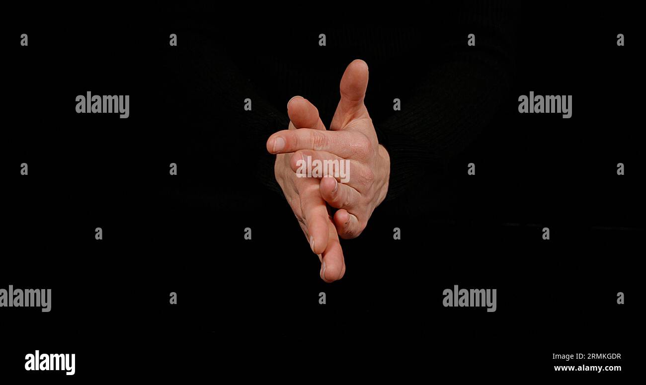 Hands of Woman Clapping against Black Background Stock Photo - Alamy