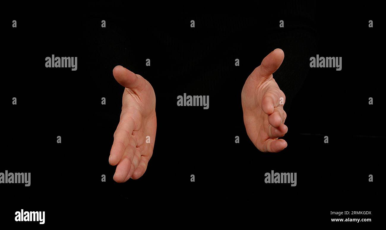 Woman clapping hands in studio hi-res stock photography and images - Alamy