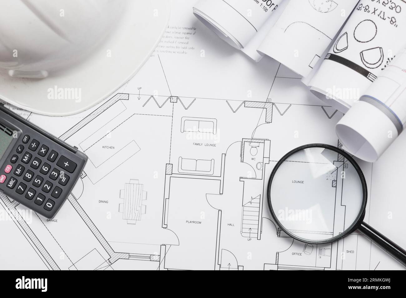 Blueprint with magnifying glass Stock Photo - Alamy