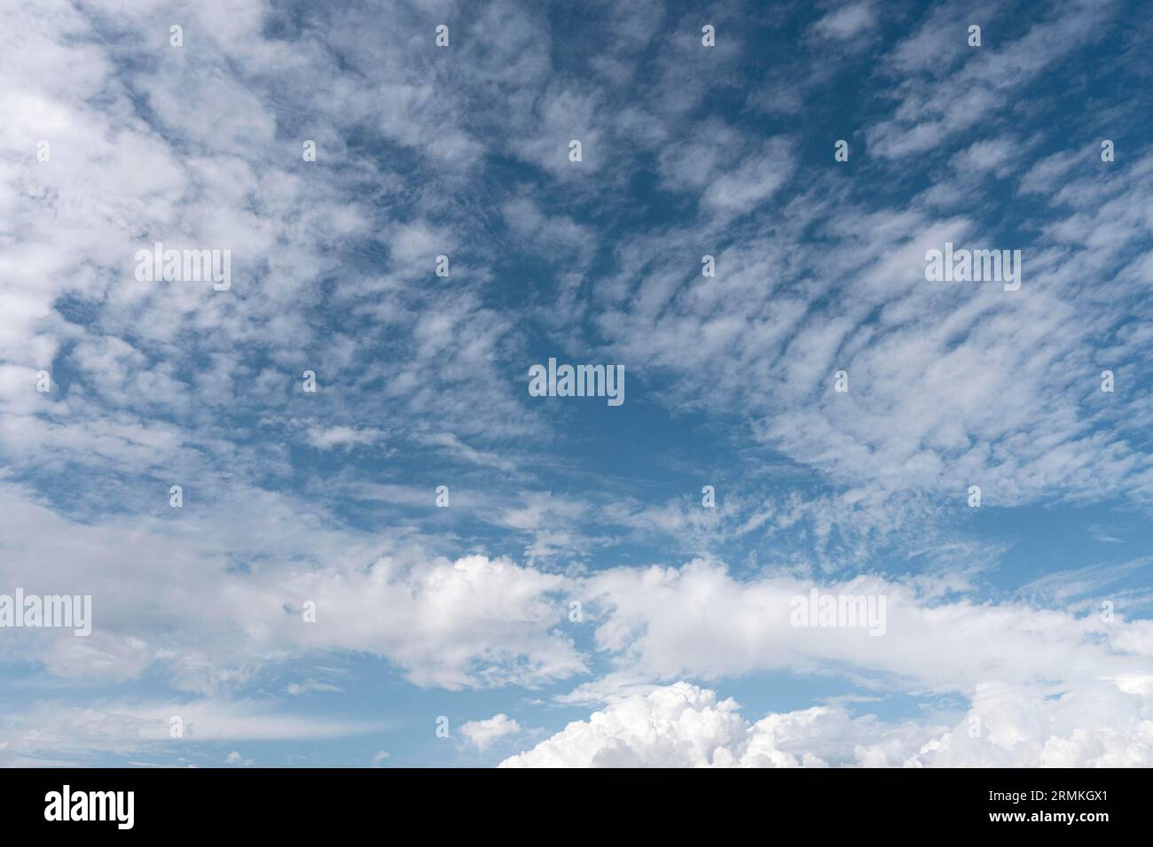Blue sky with windy clouds horizontal shot Stock Photo - Alamy