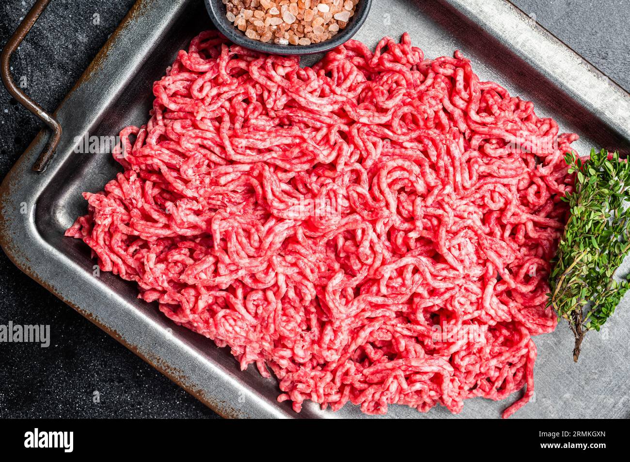 Unccoked Mince Ground meat, raw mincemeat beef and pork in a kitchen ...