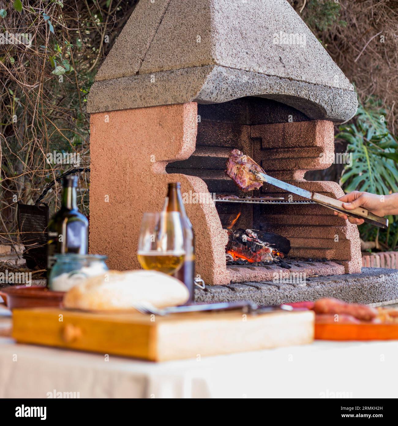 Barbecue flame man fire hand food hi-res stock photography and images ...