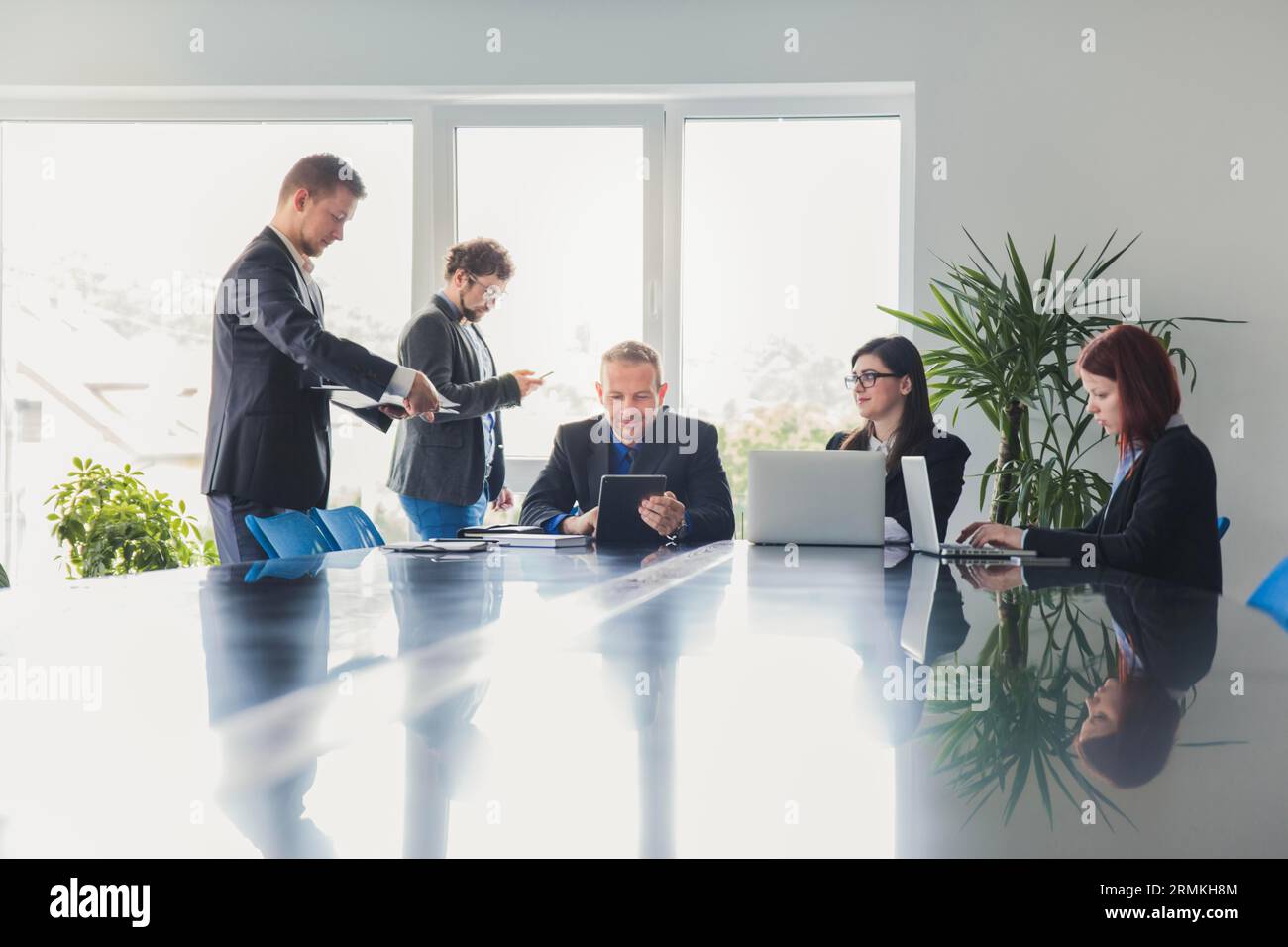 Coworkers meeting hall office Stock Photo - Alamy