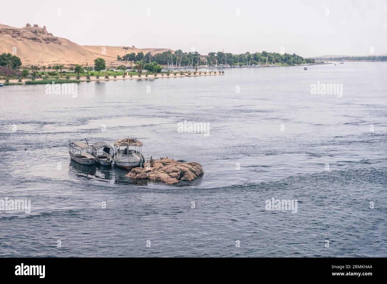 Egypt Summer Travel Riverside Tranquility: Small Boats by Luxor's Nile ...