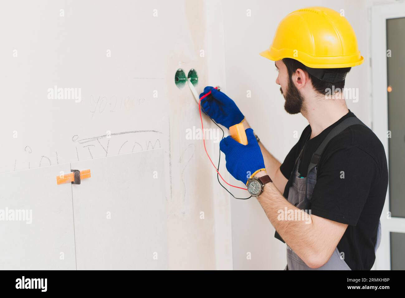 Electrician working with cables Stock Photo - Alamy