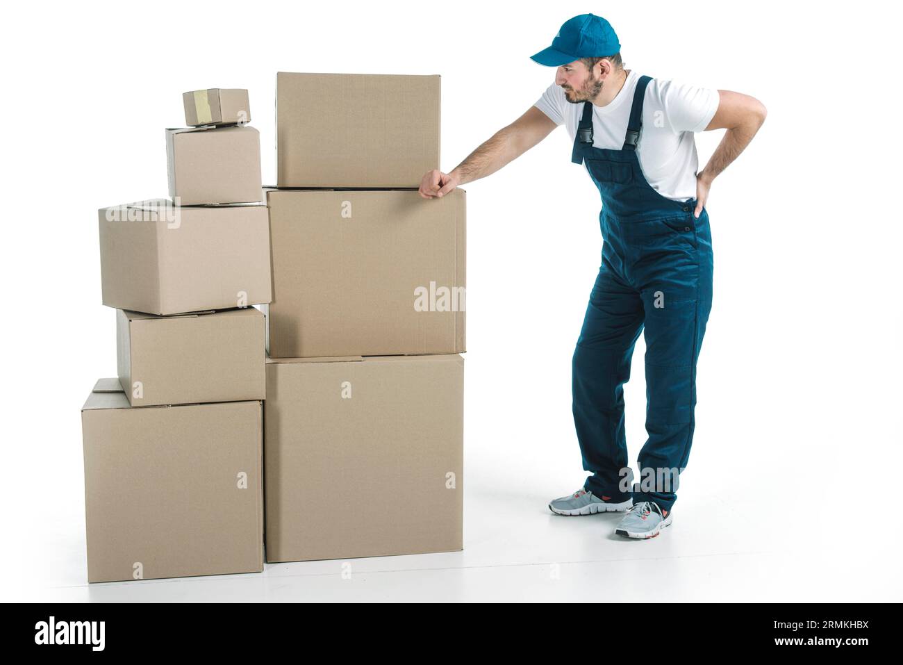 Deliveryman with sore back Stock Photo - Alamy
